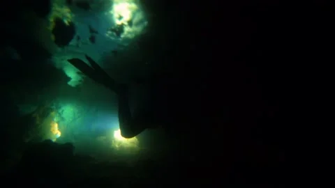 Scuba Diving in a Dark Shallow Cave with... | Stock Video | Pond5