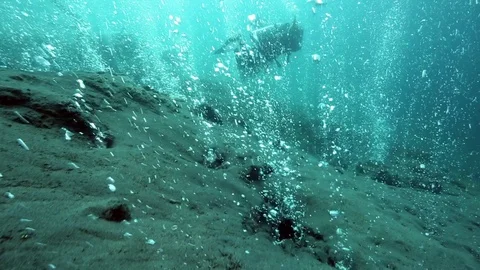 Scuba diving at hot springs underwater v... | Stock Video | Pond5