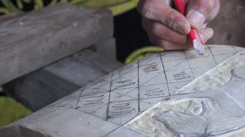 Sculptor hand with pencil marking stone ... | Stock Video | Pond5