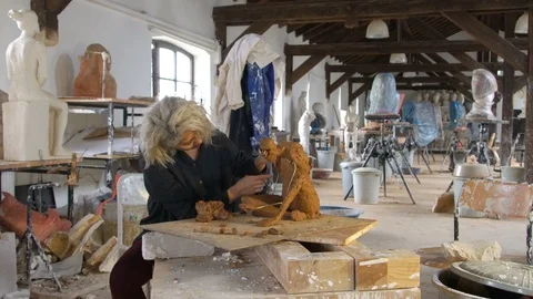 Sculptress Sculptor is sculpting realist... | Stock Video | Pond5