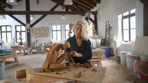 Sculptress Sculptor is sculpting realist... | Stock Video | Pond5
