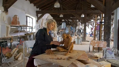 Sculptress Sculptor is sculpting realist... | Stock Video | Pond5