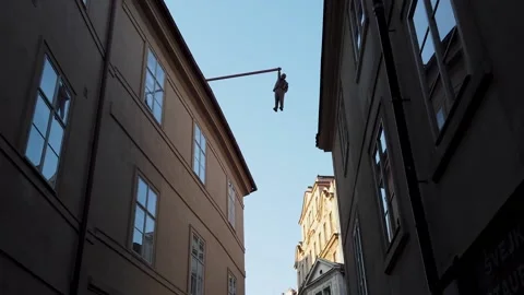 The sculpture of the Man Hanging Out by ... | Stock Video | Pond5