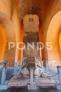 A sculpture of a turtle inside a tower in the tomb of Chinese emperors ...