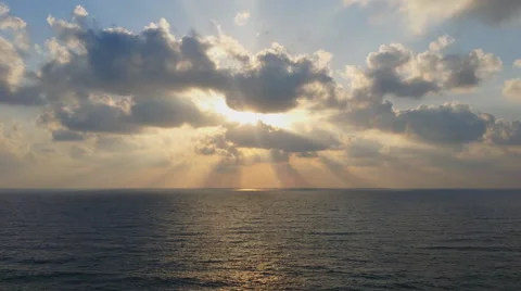 Sea and glorious sunset through clouds | Stock Video | Pond5