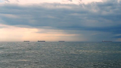 Sea, big dark rain clouds on sky, grain ... | Stock Video | Pond5