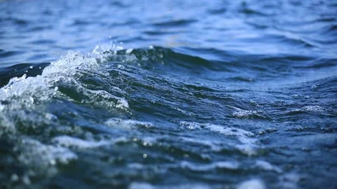 Sea splash waves after motor boat. slow ... | Stock Video | Pond5