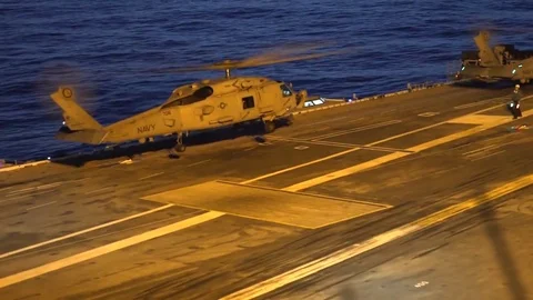 Seahawk helicopter landing aboard USS Ge... | Stock Video | Pond5