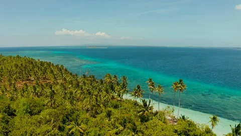 Seascape with island and sandy beach. Ba... | Stock Video | Pond5