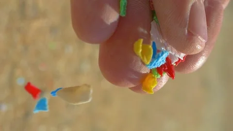 secondary microplastics in hands close u... | Stock Video | Pond5