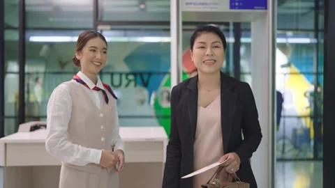 Security agent at airport check in gate ... | Stock Video | Pond5