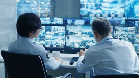 In the Security Control Room Two Officer... | Stock Video | Pond5