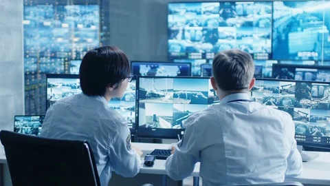 In the Security Control Room Two Officer... | Stock Video | Pond5