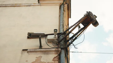 Security fixture mounted on building sid... | Stock Video | Pond5