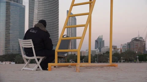 Security guard at the Corniche beach in ... | Stock Video | Pond5