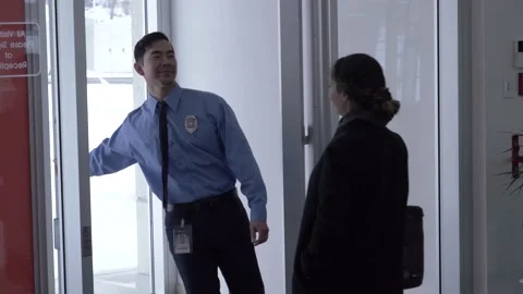 Door Security Guard Stock Footage ~ Royalty Free Stock Videos | Pond5