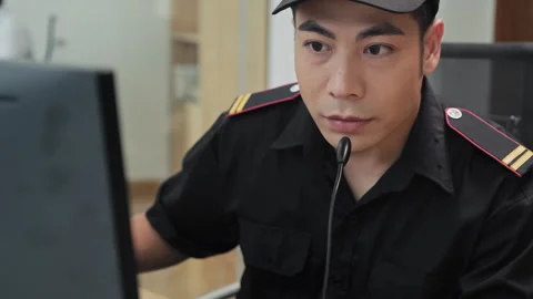 Security Guard Talking on Microphone whi... | Stock Video | Pond5