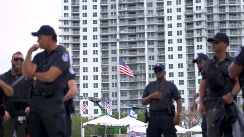 Security guards standing with USA flag o... | Stock Video | Pond5