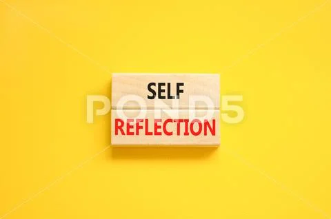 Self reflection symbol. Concept word Self reflection typed on wooden ...