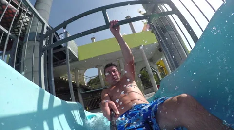 SELFIE: Happy young man sliding down the... | Stock Video | Pond5