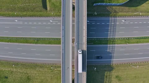 Semi-truck with white trailer crossing t... | Stock Video | Pond5
