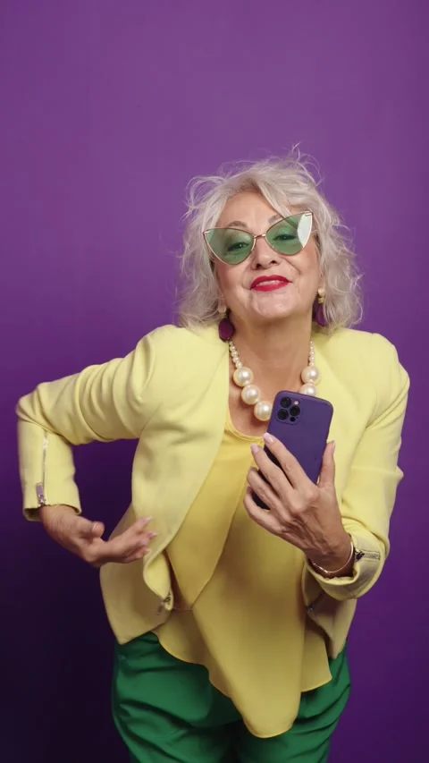 Senior influencer posing for vertical vi... | Stock Video | Pond5