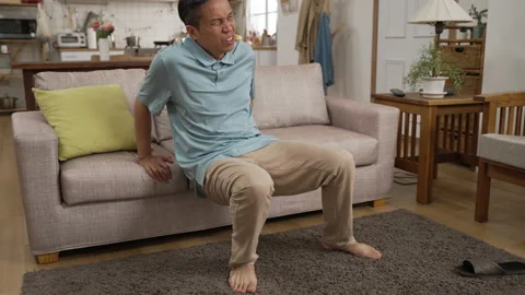 senior man hurt his back after fall acci... | Stock Video | Pond5