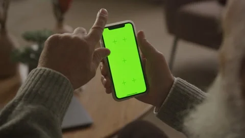 Senior Man Scroll on Vertical Green Scre... | Stock Video | Pond5