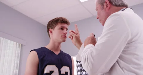 Senior medical doctor checking basketbal... | Stock Video | Pond5