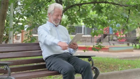 Senior Old Man Celebrating Success on Ta... | Stock Video | Pond5