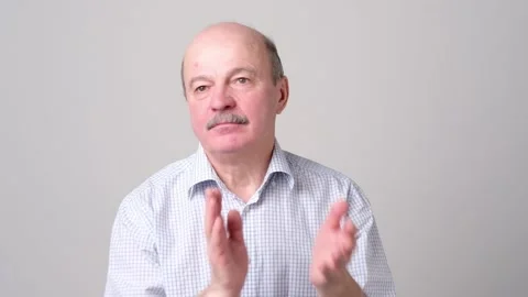 Senior sad man clapping hands with disap... | Stock Video | Pond5
