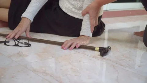 Senior woman falling down at home becaus... | Stock Video | Pond5