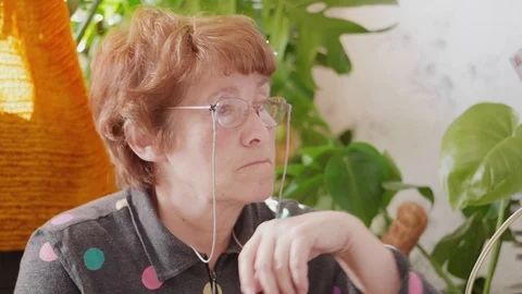 Senior Sitting Pappers Stock Videos – Royalty-Free HD & 4K Videos