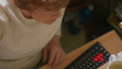 Senior woman talking by messenger on com... | Stock Video | Pond5