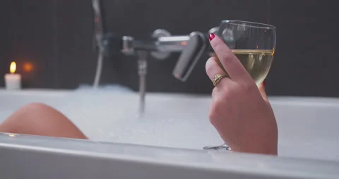 A sensual scene of a girl bathing with c... | Stock Video | Pond5