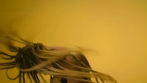 Sensual woman shaking hair in dreadlocks... | Stock Video | Pond5