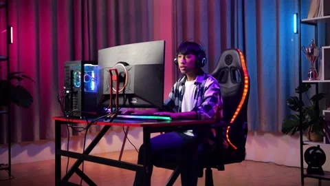 Serious Asian Teen Boy Gamer Playing Vid... | Stock Video | Pond5