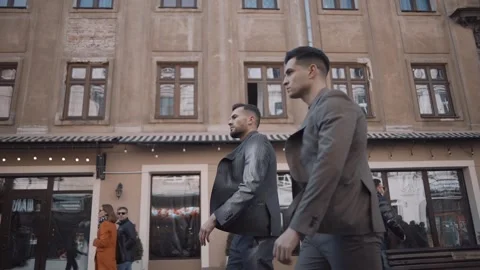 Serious businessmen walking in suits in ... | Stock Video | Pond5