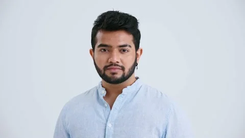 Serious Indian man with piercing opening... | Stock Video | Pond5