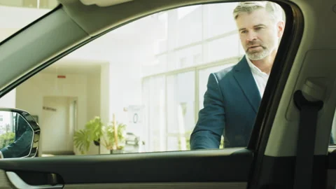 Serious middle age customer standing nea... | Stock Video | Pond5