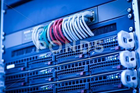 Server rack cluster in a data center (shallow DOF; color toned i Stock ...