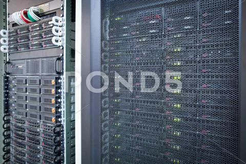 Server rack cluster in a data center (shallow DOF; color toned i Stock ...