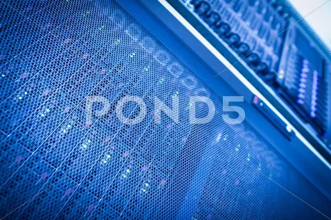 Server rack cluster in a data center (shallow DOF; color toned i Stock ...
