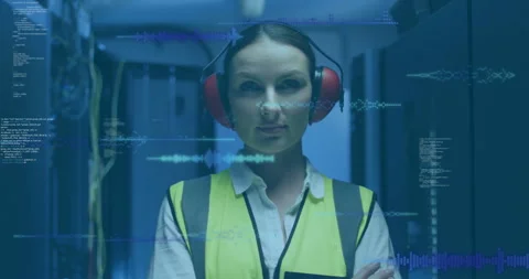 In server room, woman in safety vest and... | Stock Video | Pond5