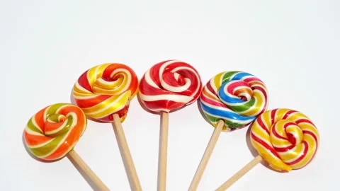 Set of colorful lollipops isolated on wh... | Stock Video | Pond5