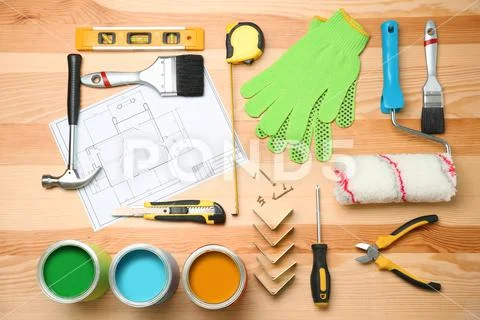 Set of decorator's tools and project drawing on wooden background Stock ...