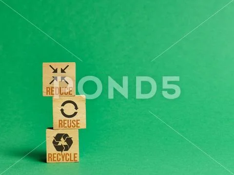 Photograph: Set of small wooden cubes with the words reduce, reuse, and ...