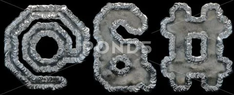 Set of symbols at, ampersand and hash made of industrial metal on black ...