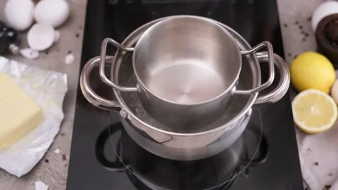 Setting up bain-marie Pot of boiling wat... | Stock Video | Pond5