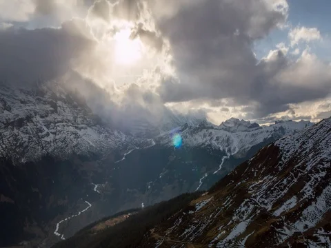 Setting sun, storm clouds and The Eiger,... | Stock Video | Pond5